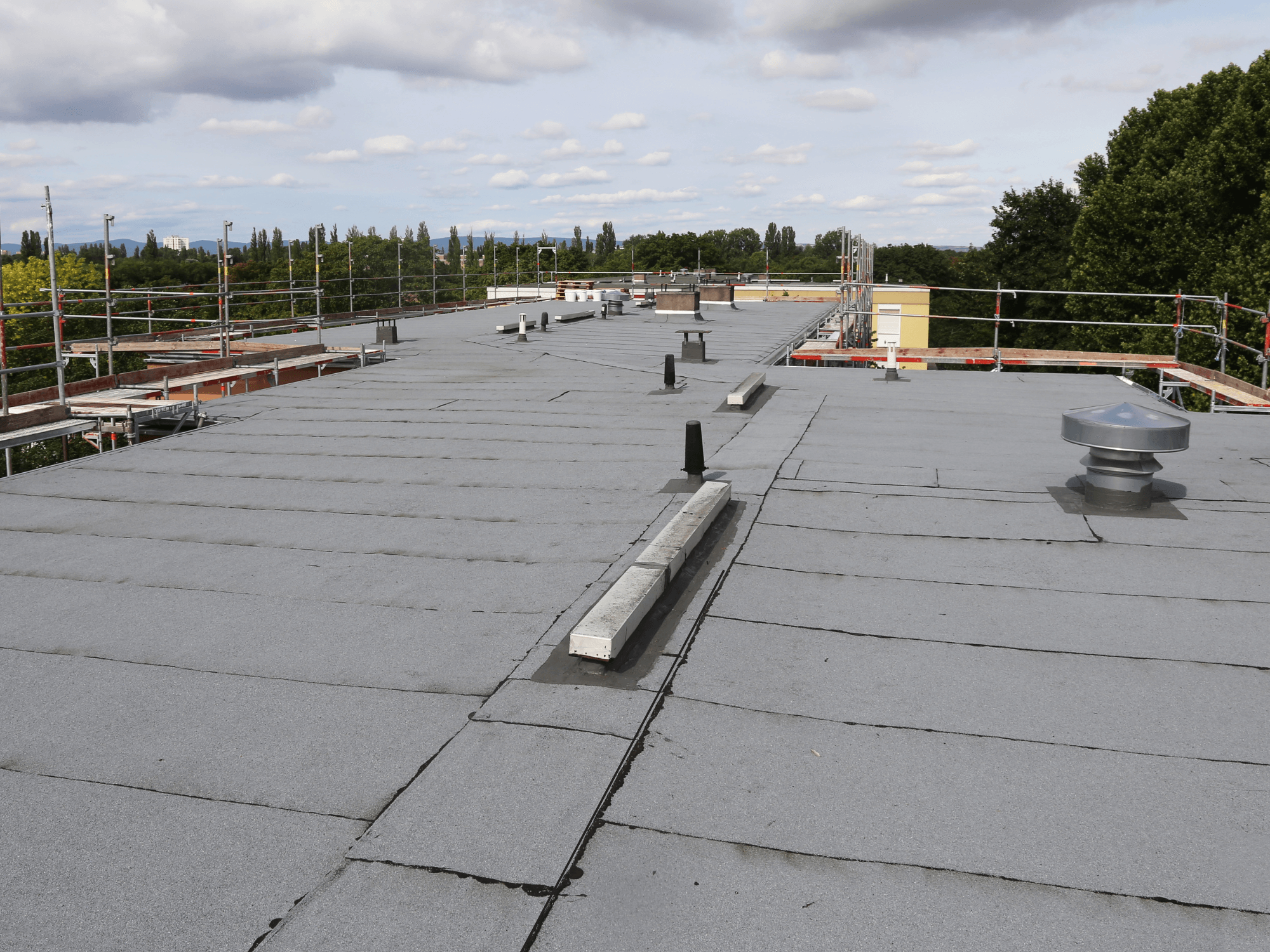 Commercial Roof Scupper Repair | Premier Restoration & Construction